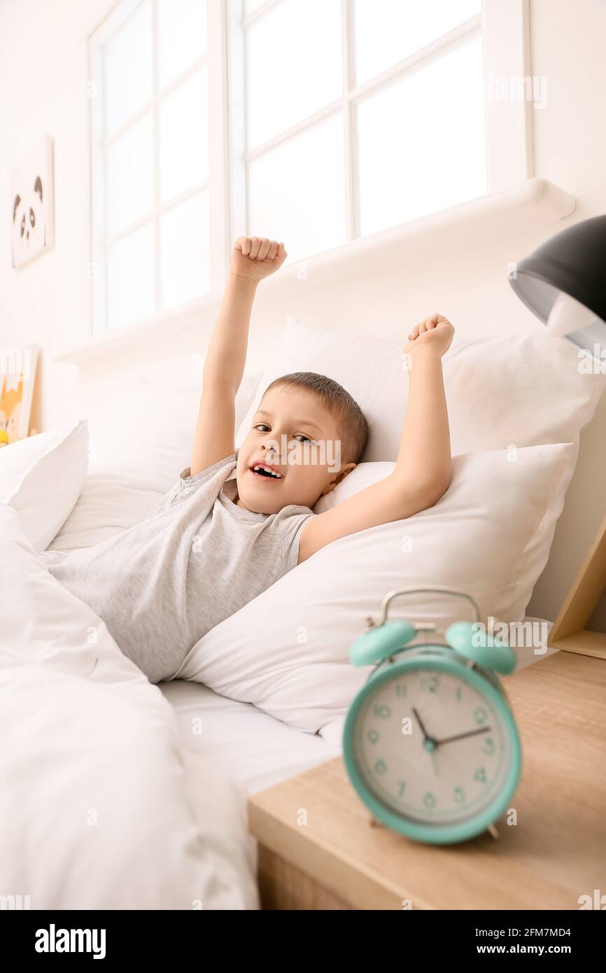 Morning of cute little boy in bedroom Stock Photo - Alamy