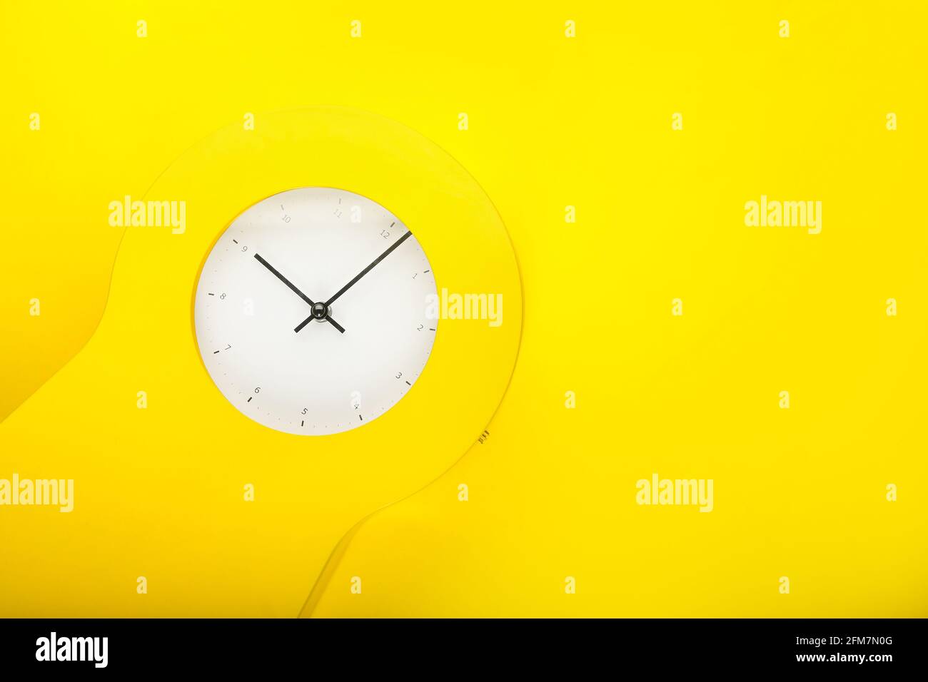 Stylish clock on color background Stock Photo - Alamy
