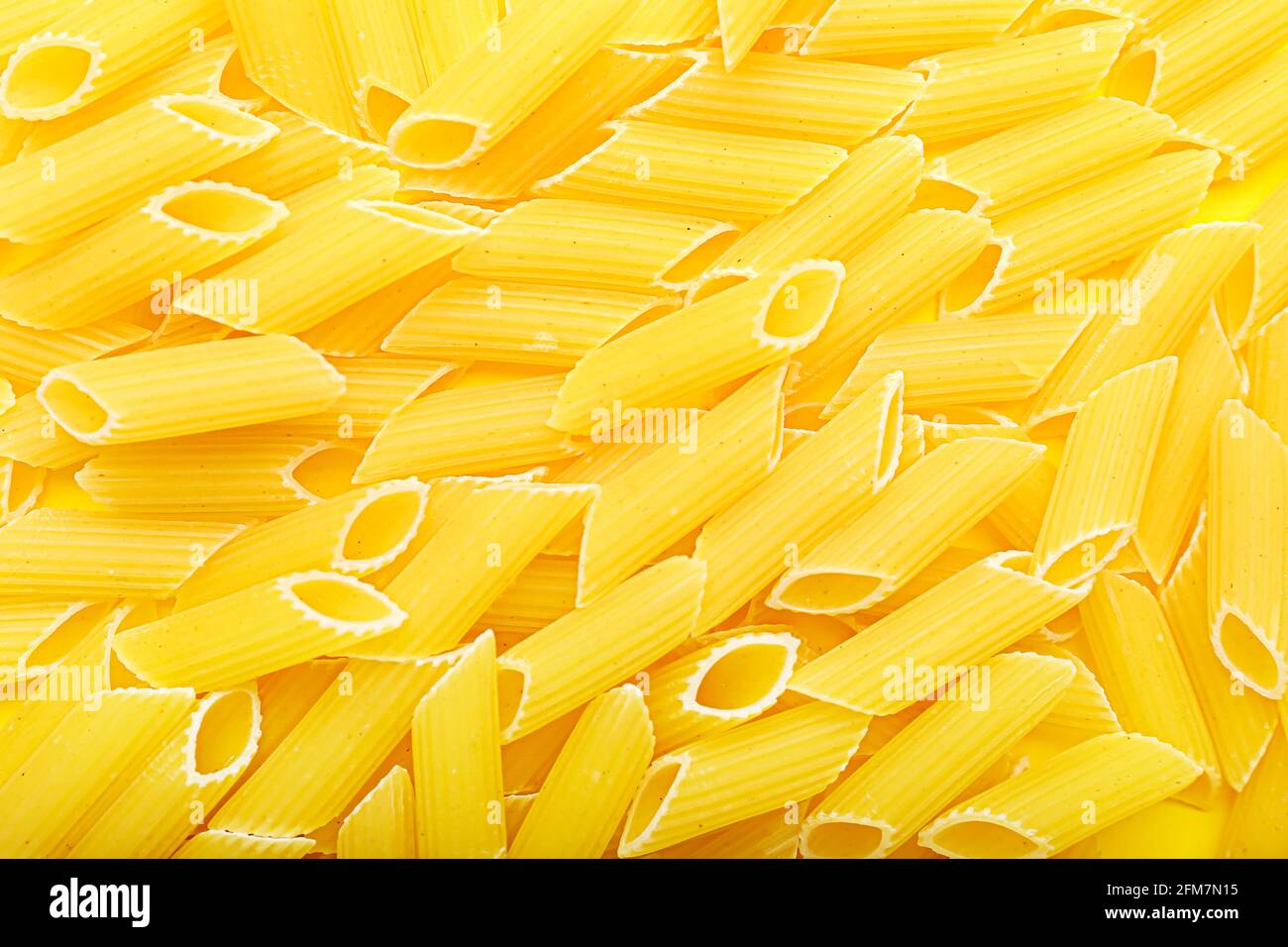 Texture of raw pasta as background Stock Photo - Alamy