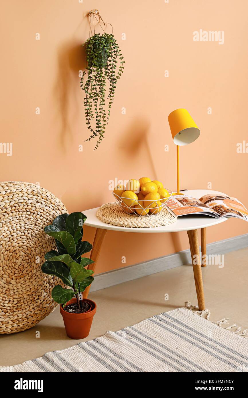 Interior of modern room with table and lamp Stock Photo - Alamy