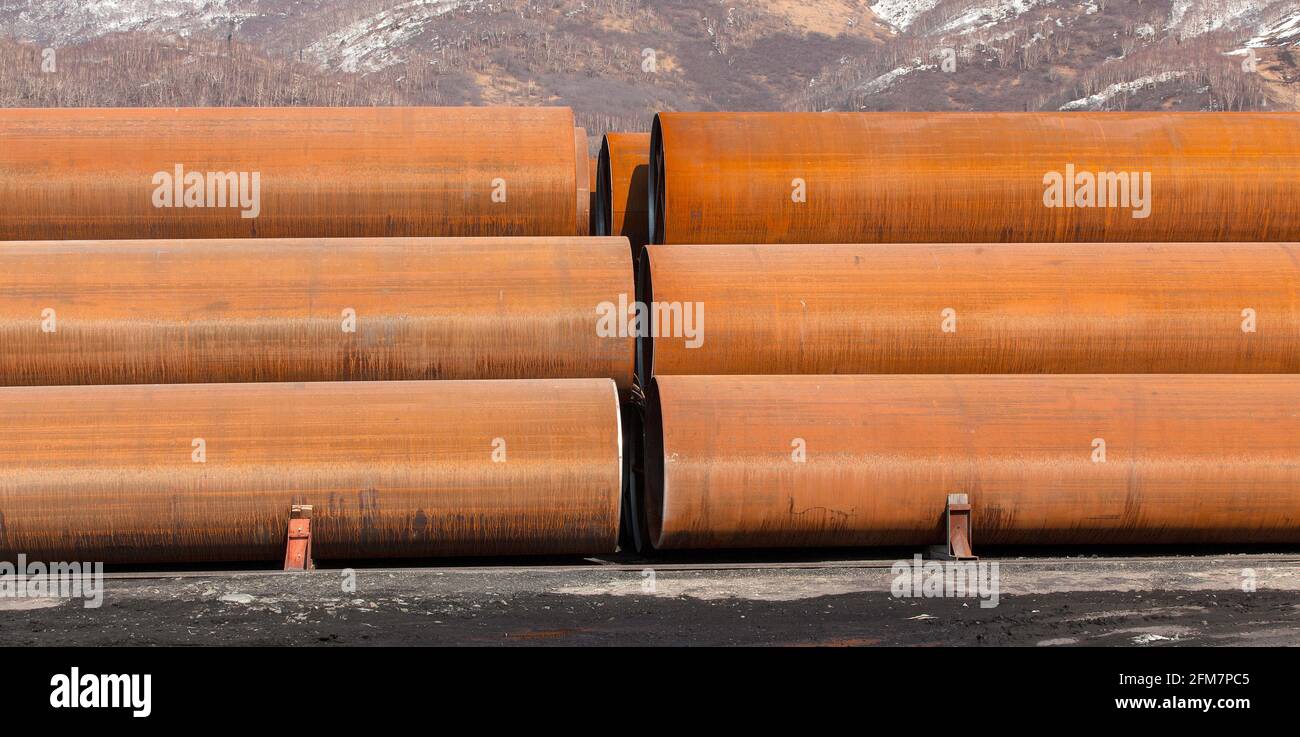 large metal pipes on the ground on Kamchatka Stock Photo - Alamy