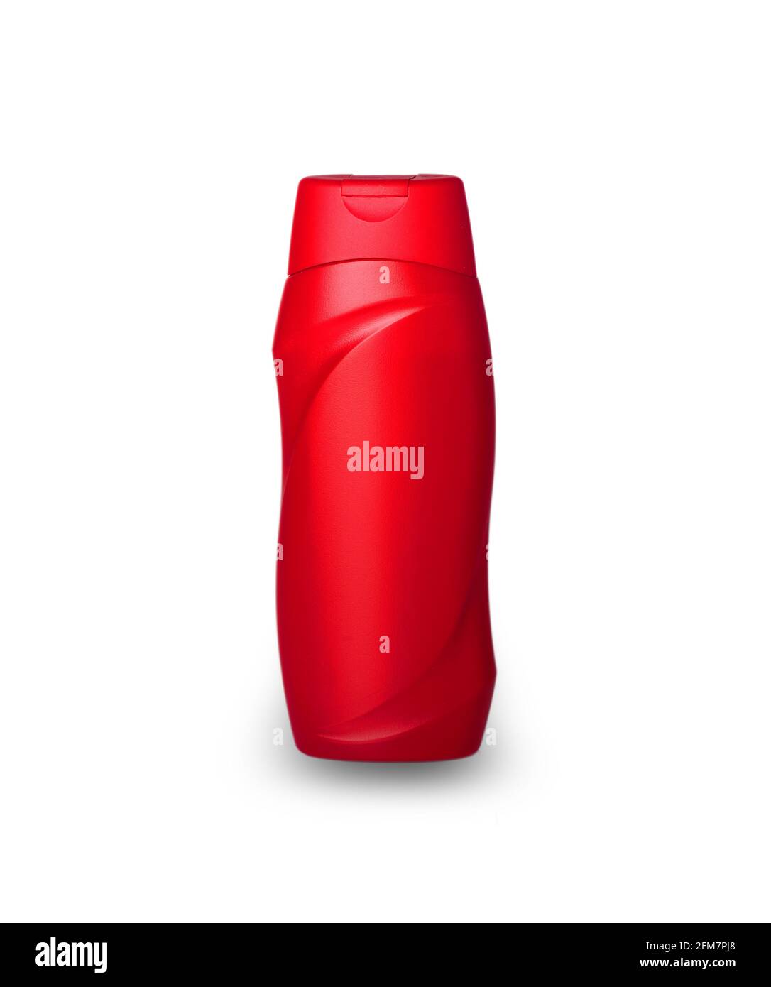 red plastic bottle with male shampoo carved on a white background Stock ...