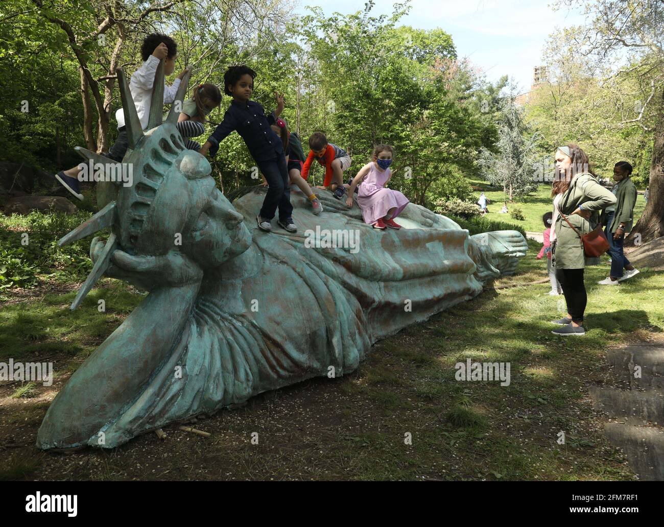 New York, New York, USA. 6th May, 2021. A view of 'Reclining Liberty' a 25 foot long sculpture ...
