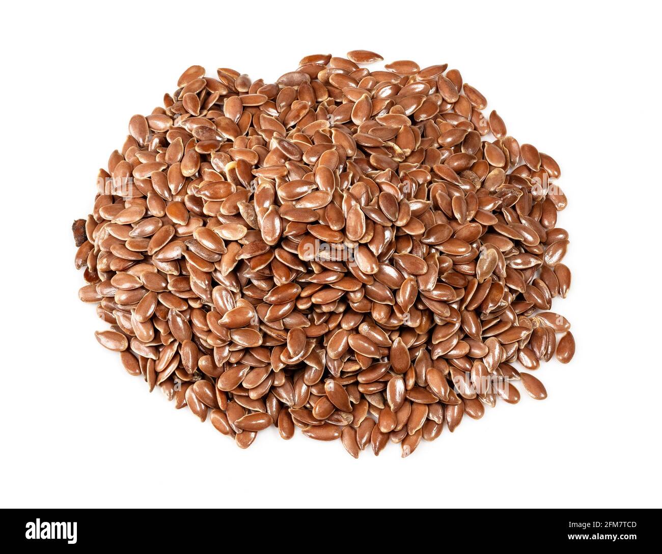 pile of brown flax seeds closeup on white background Stock Photo - Alamy