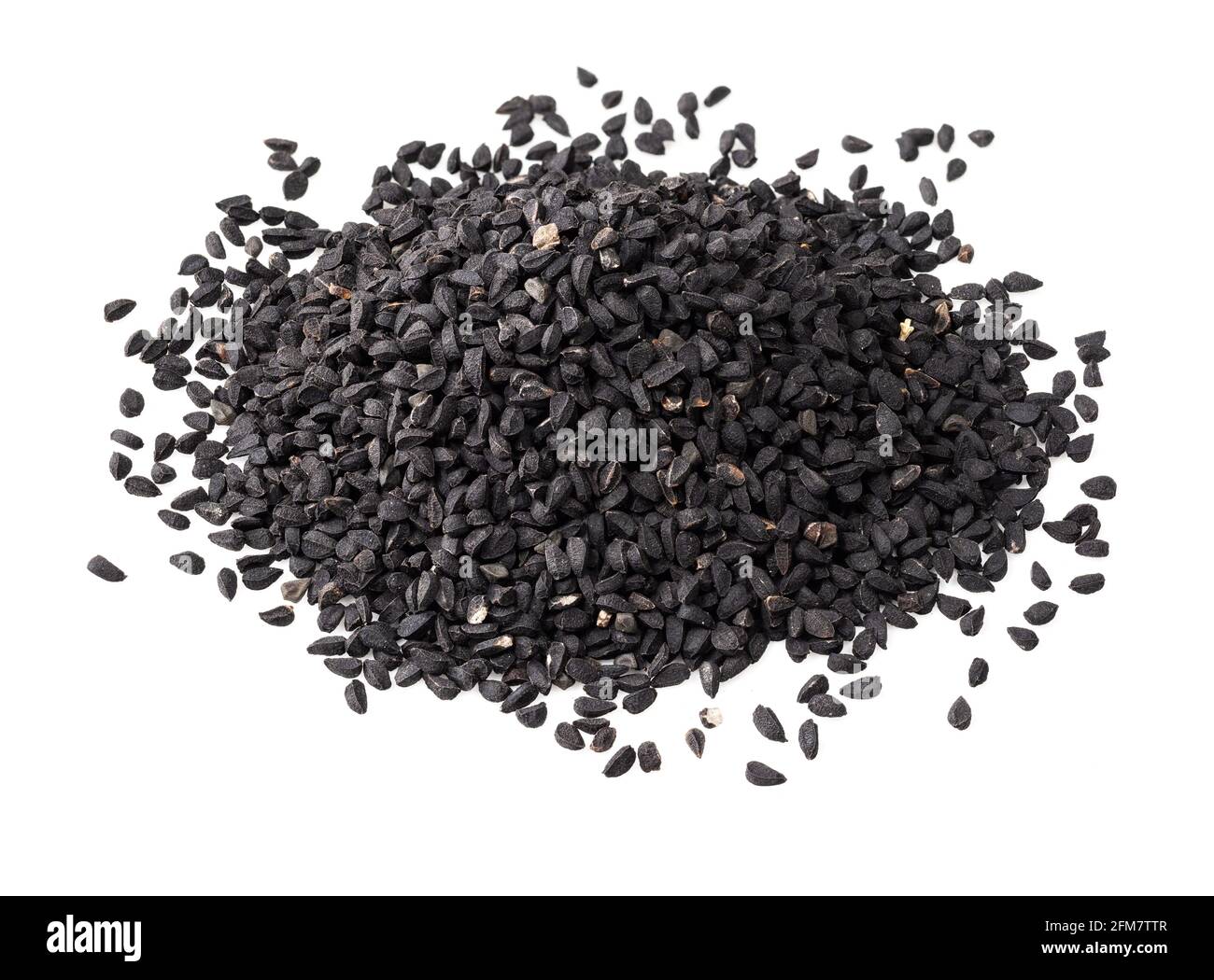 handful of Nigella sativa seeds (black caraway) closeup on white ...