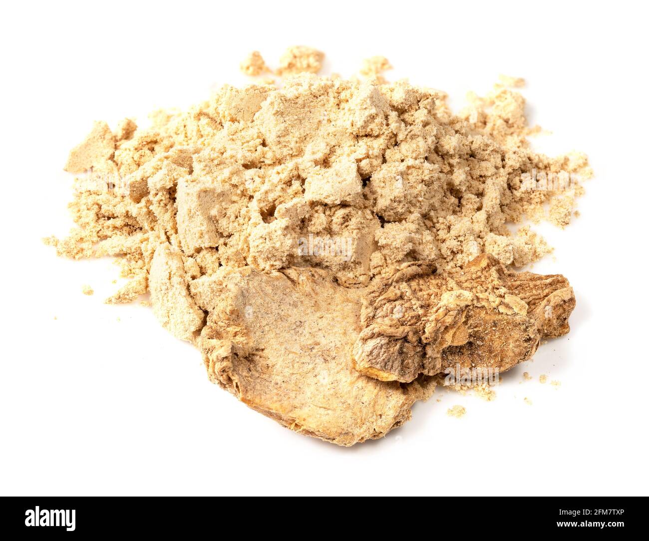 handful of dried ginger roots and powder closeup on white background ...