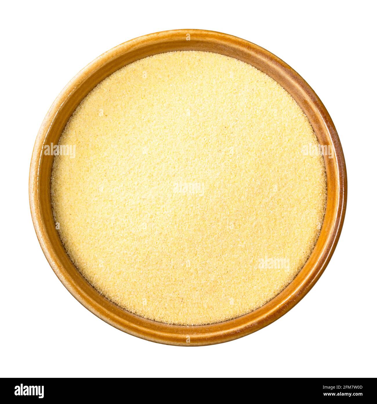 top view of raw semolina from durum wheat in round bowl cutout on white ...