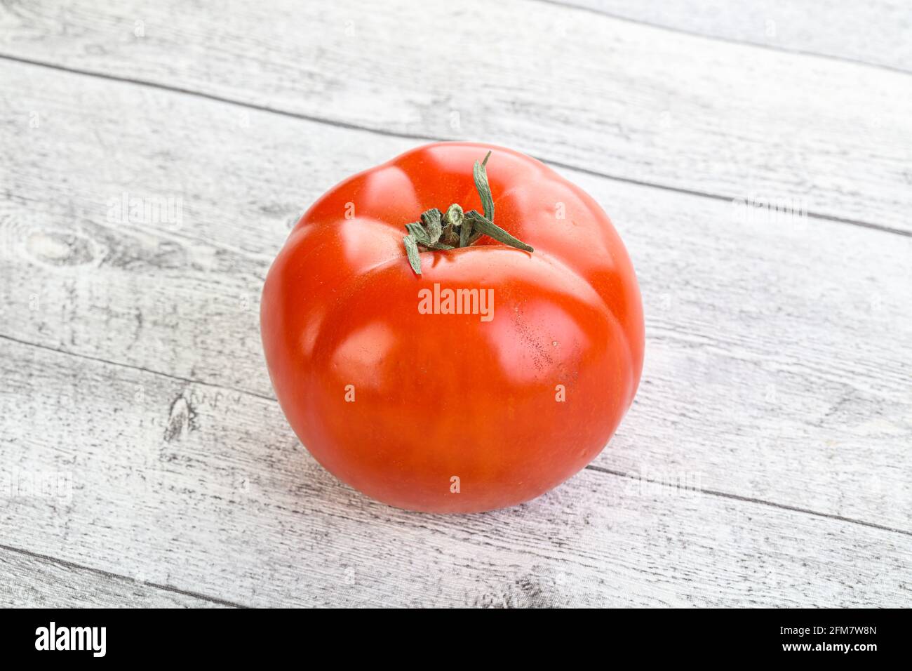 Red ripe big juicy tomato isolated Stock Photo - Alamy