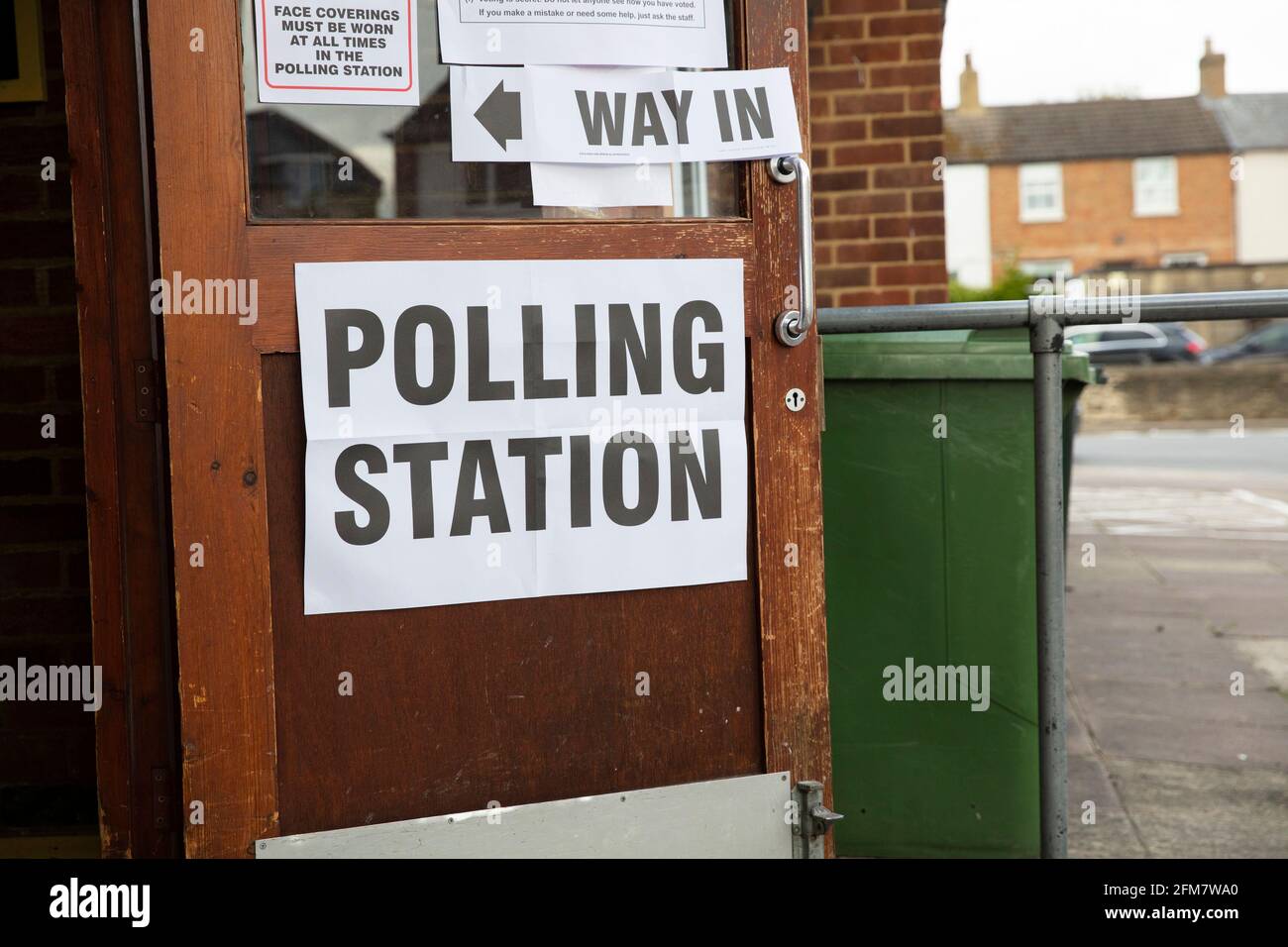 Polling station sign outside the entrance to a political voting ...