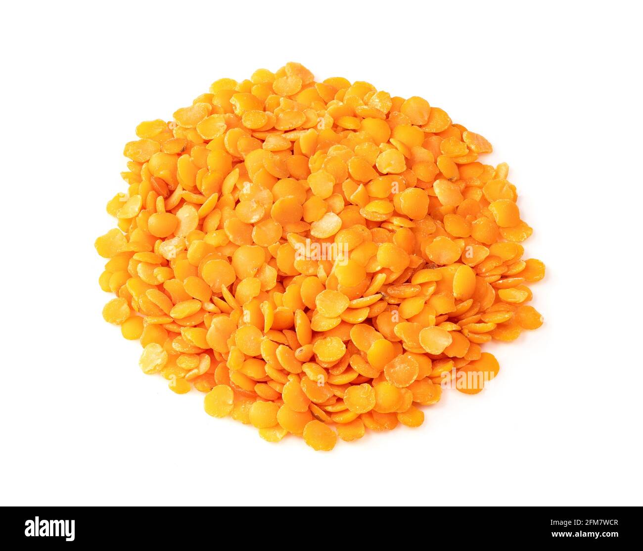 pile of split red lentils closeup on white background Stock Photo - Alamy