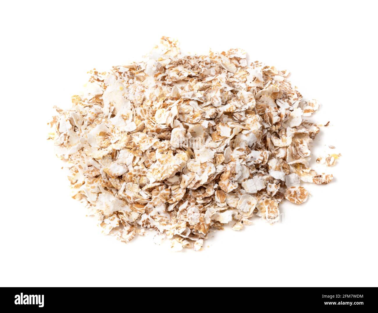 handful of instant wholegrain cereals flakes closeup on white ...