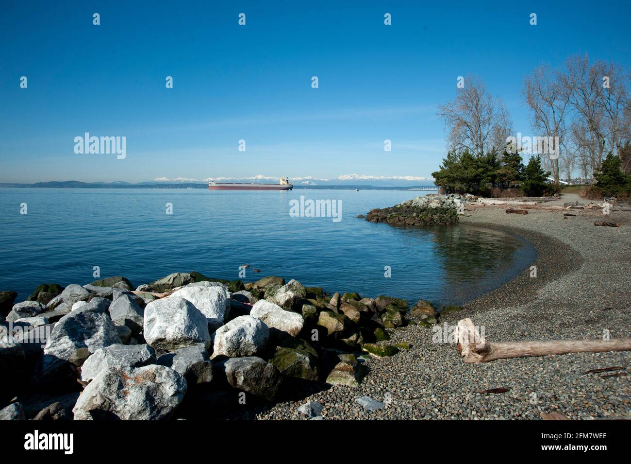 Olympic Sculpture Park Pocket Beach and Cargo Ship Stock Photo - Alamy