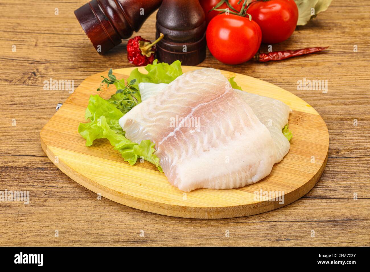 Raw pangasius fillet fish for cooking Stock Photo - Alamy