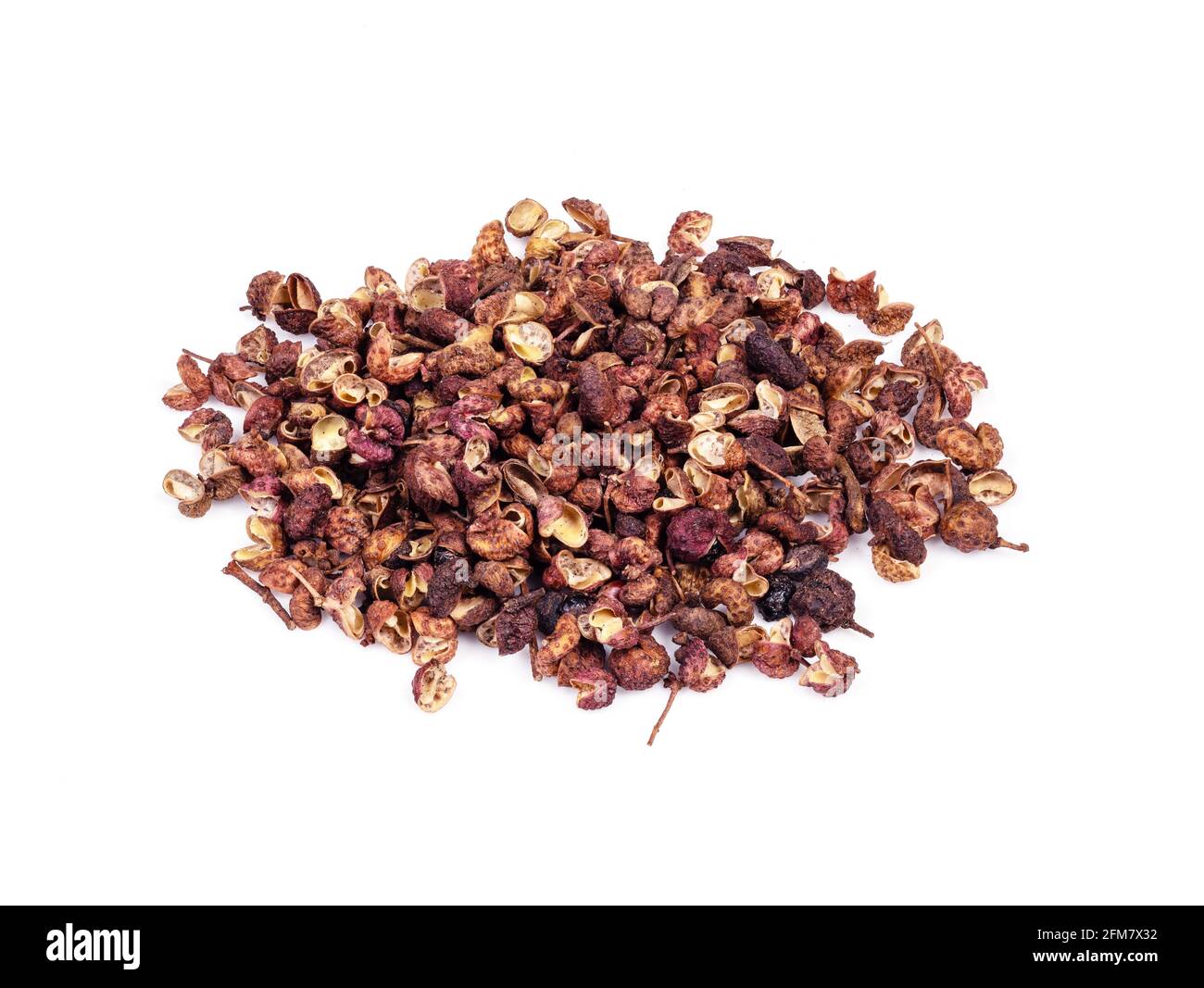 pile of dried pink sichuan pepper closeup on white background Stock ...
