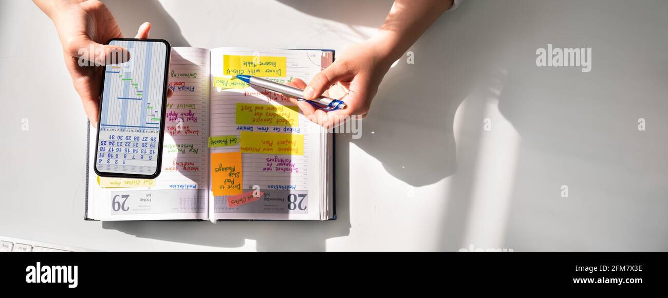 Calendar Schedule List In Diary And In Mobile Phone Stock Photo - Alamy