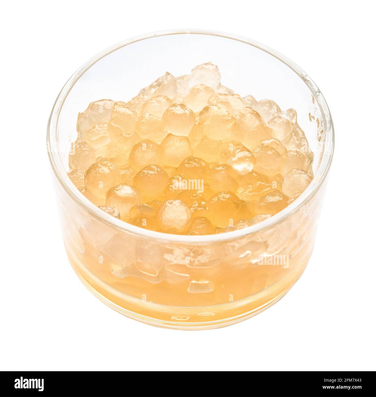 boiled tapioca balls in glass bowl cutout on white background Stock ...