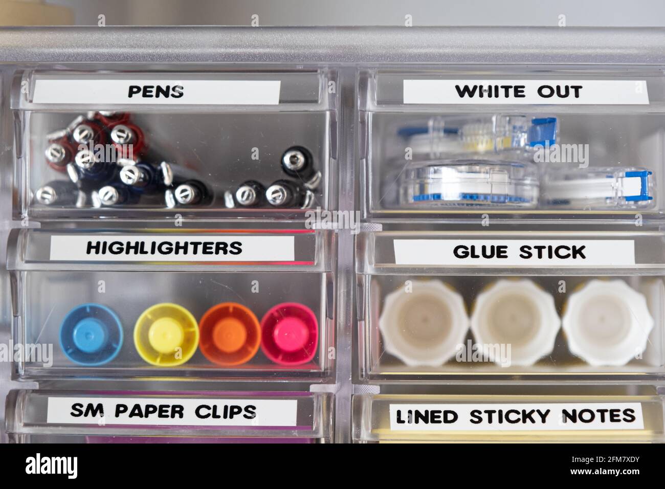 Office Stationery arranged in bins in offce Stock Photo - Alamy