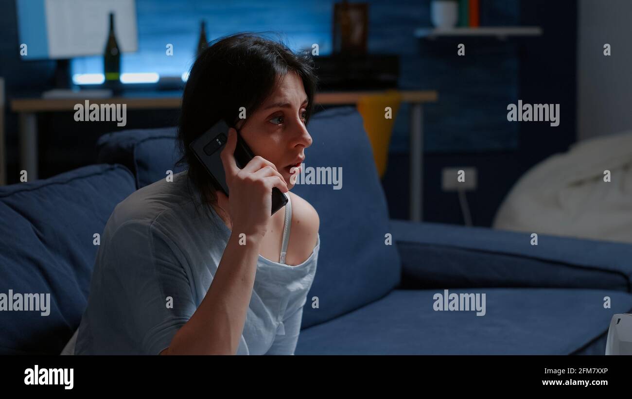 Shocked alone woman listening phone call, receving tragic news dropping ...