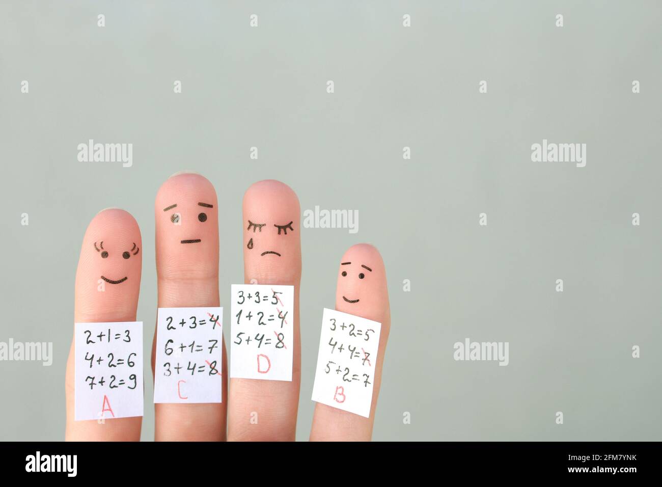 Fingers art of students with different grades in the notebooks Stock ...