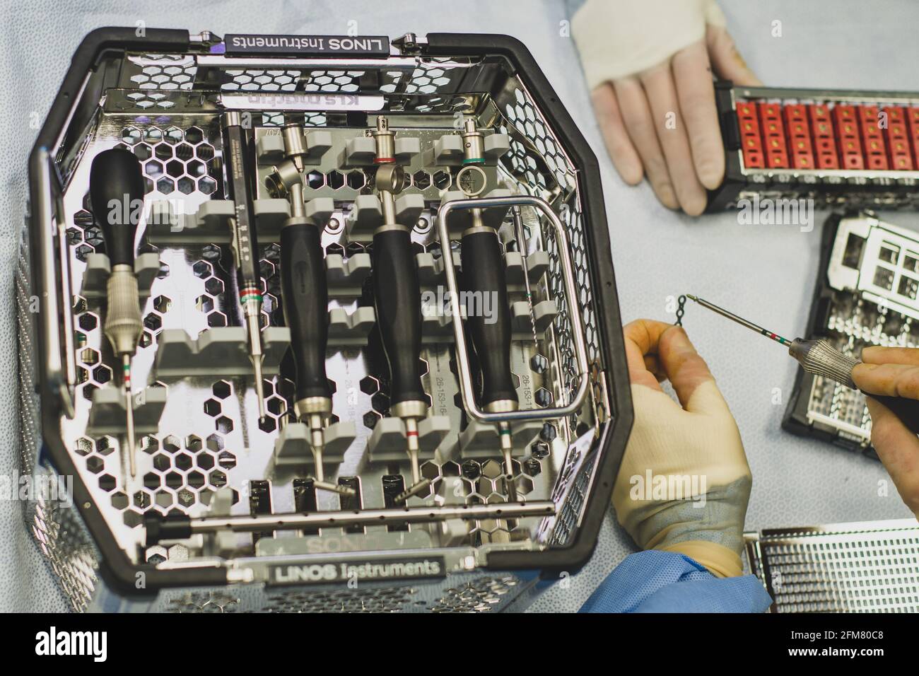 Surgical instruments in use during an operation Stock Photo - Alamy