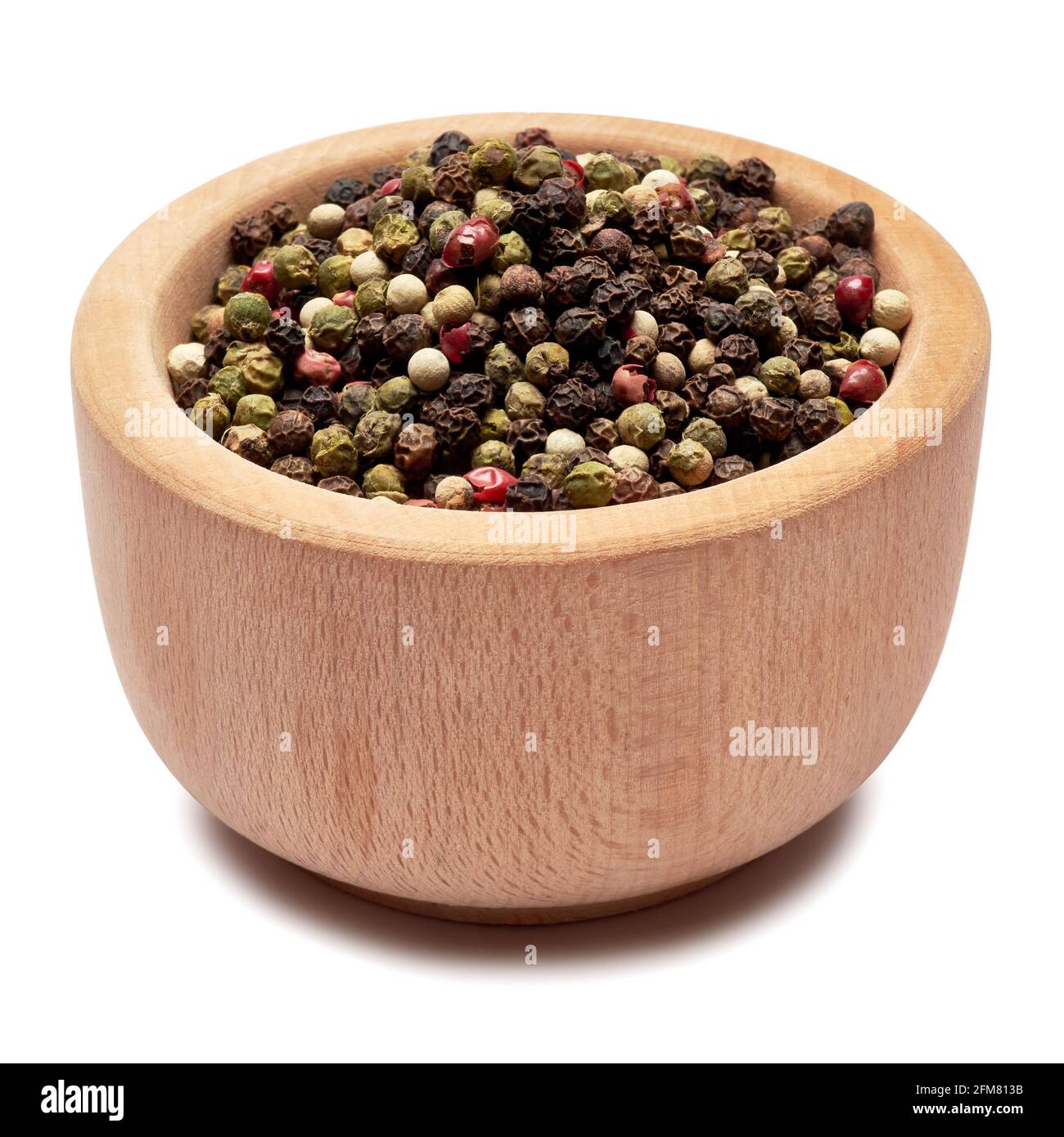 black round pepper spice in wooden bowl or mortar on white background ...