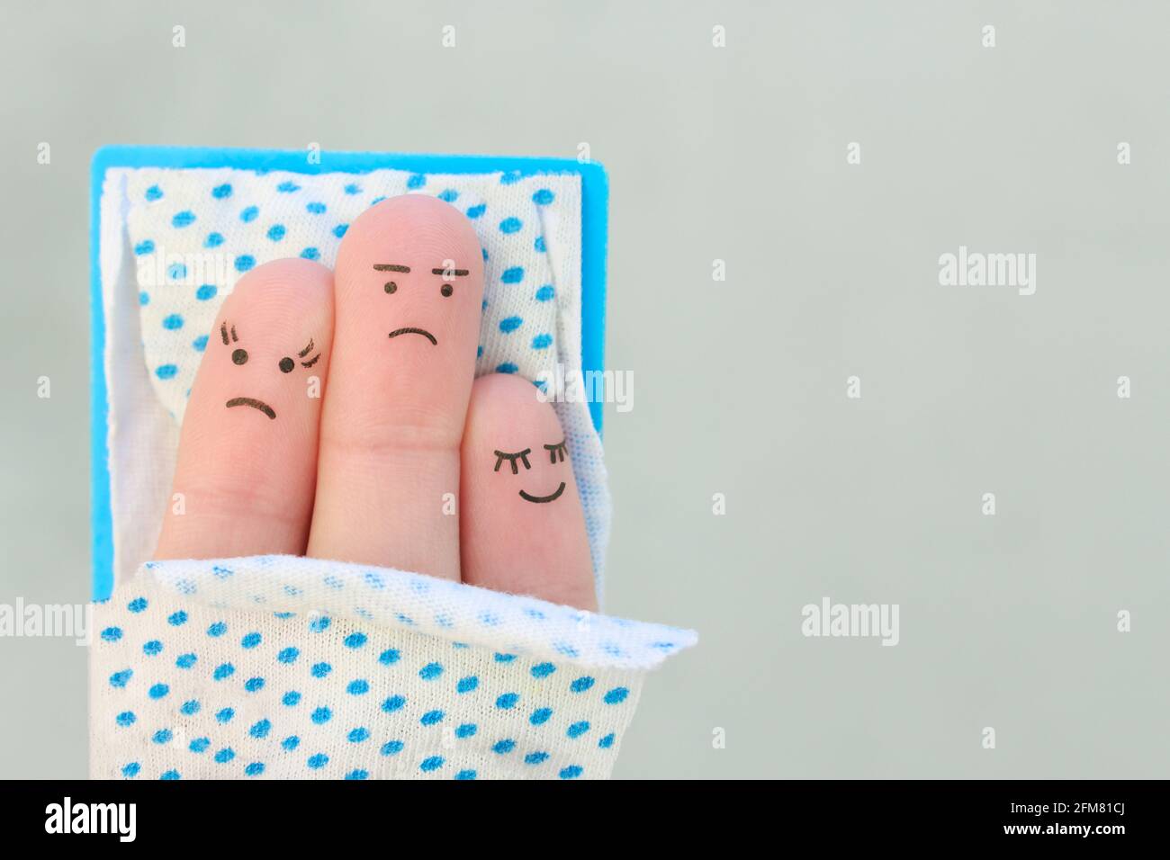 Fingers art of family sleep together. Concept of child prevents parents ...