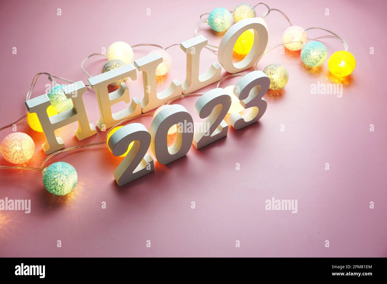 Hello 2023 alphabet letter with cotton ball LED decoration on pink ...
