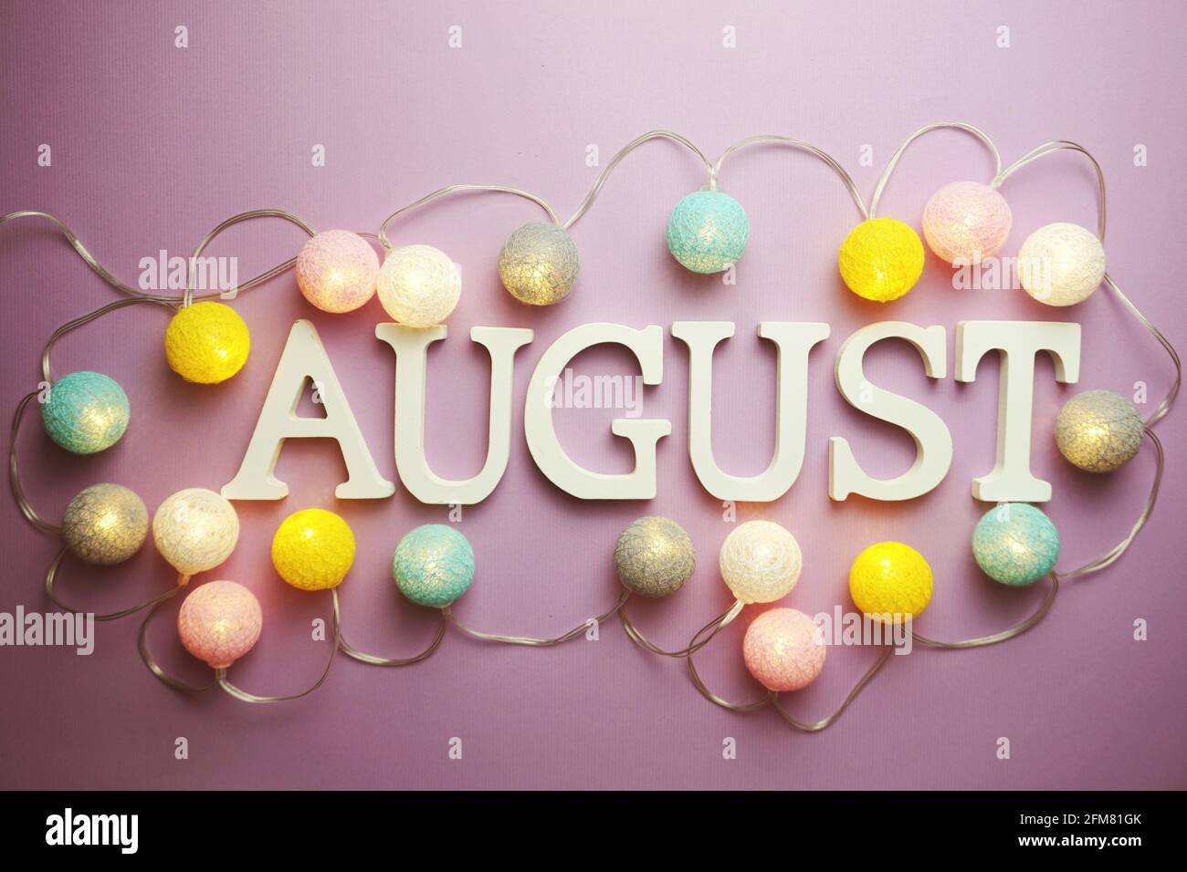 August alphabet letter with cotton ball LED decoration on purple ...