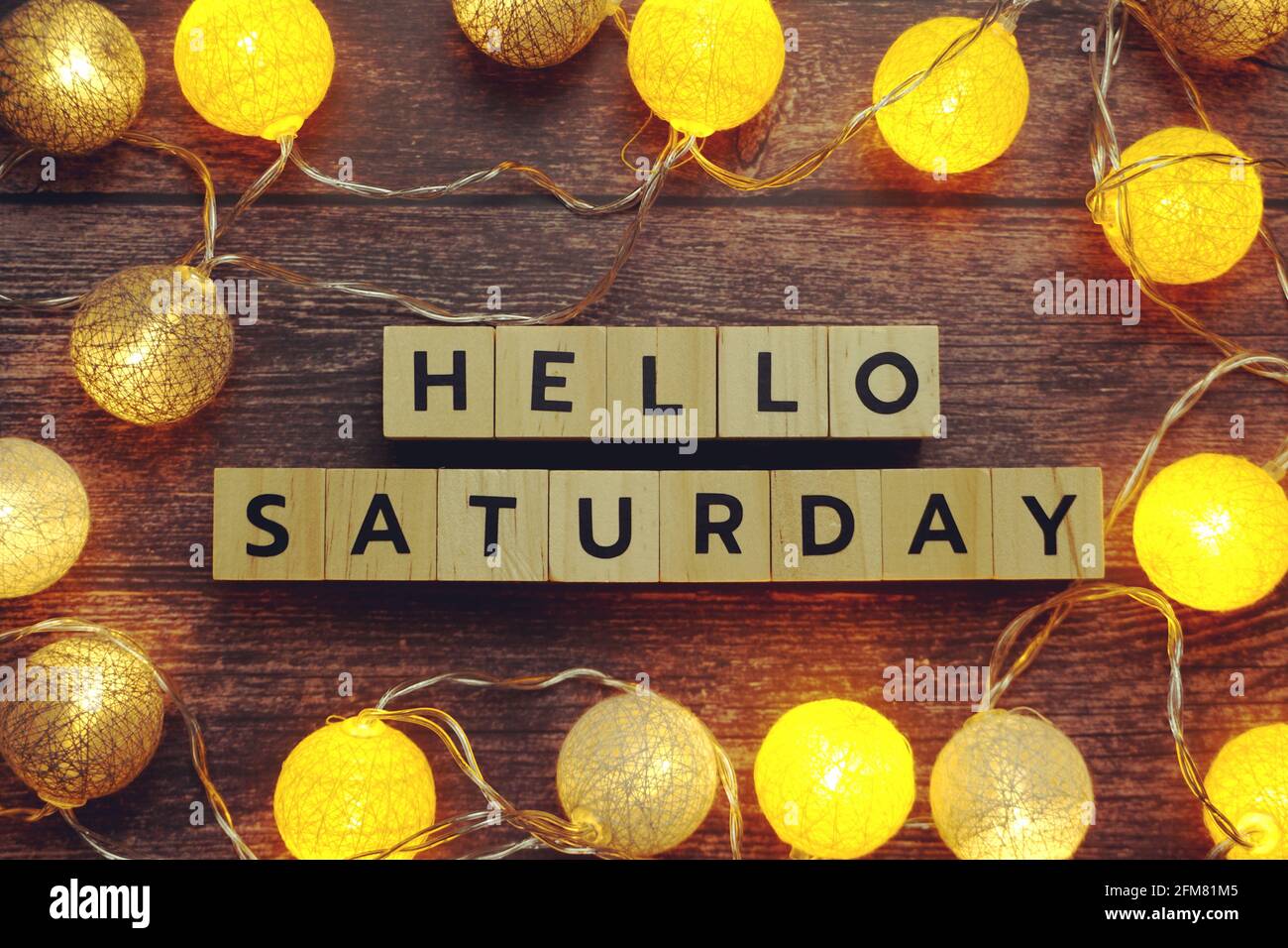 Hello Saturday alphabet letter with LED cotton balls on wooden ...