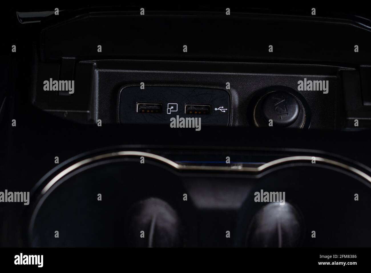 Opened car USB port in the car for connecting device. Power output of ...