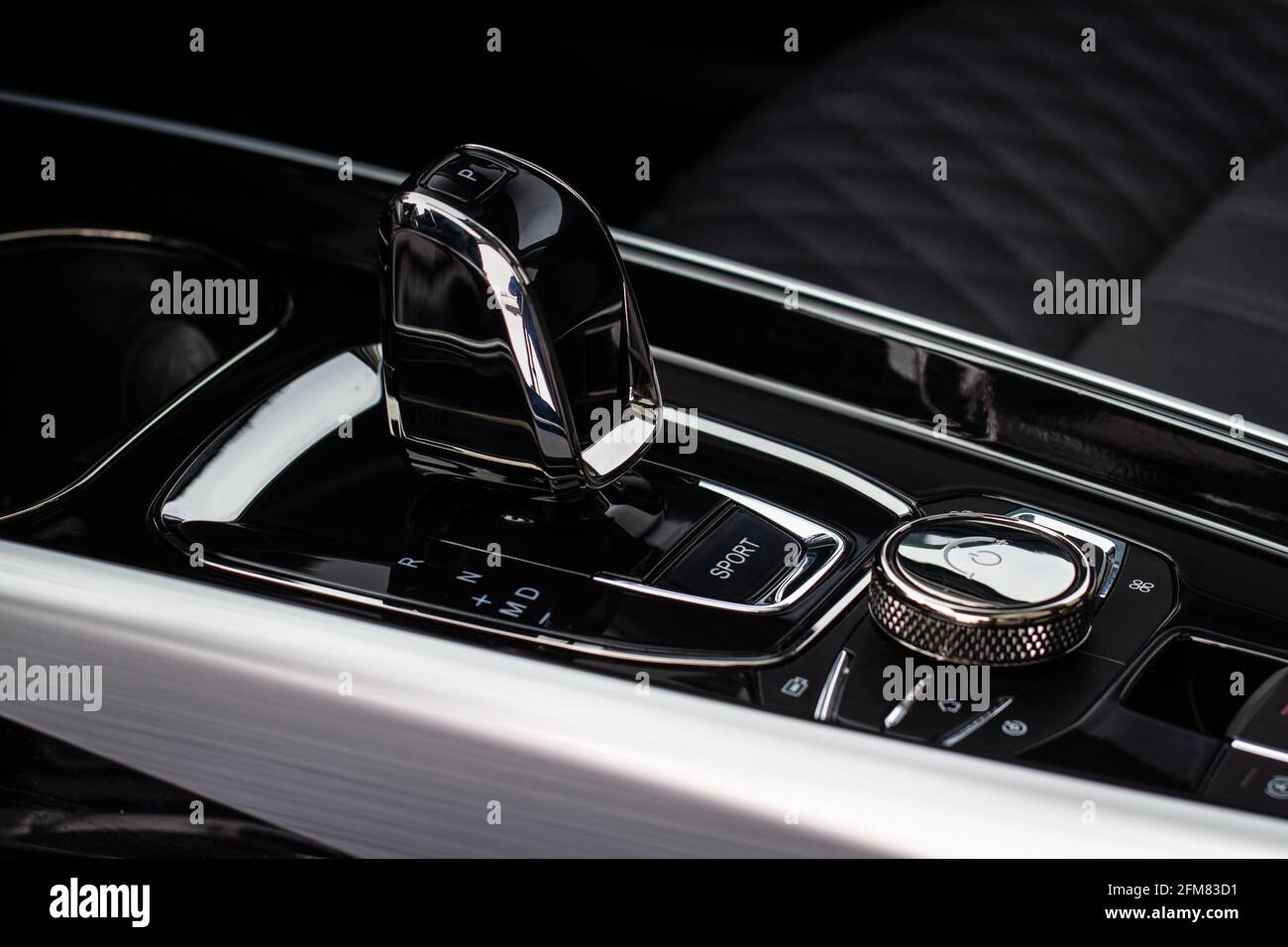 Close up of the automatic gearbox lever. Gear shift handle in a modern ...