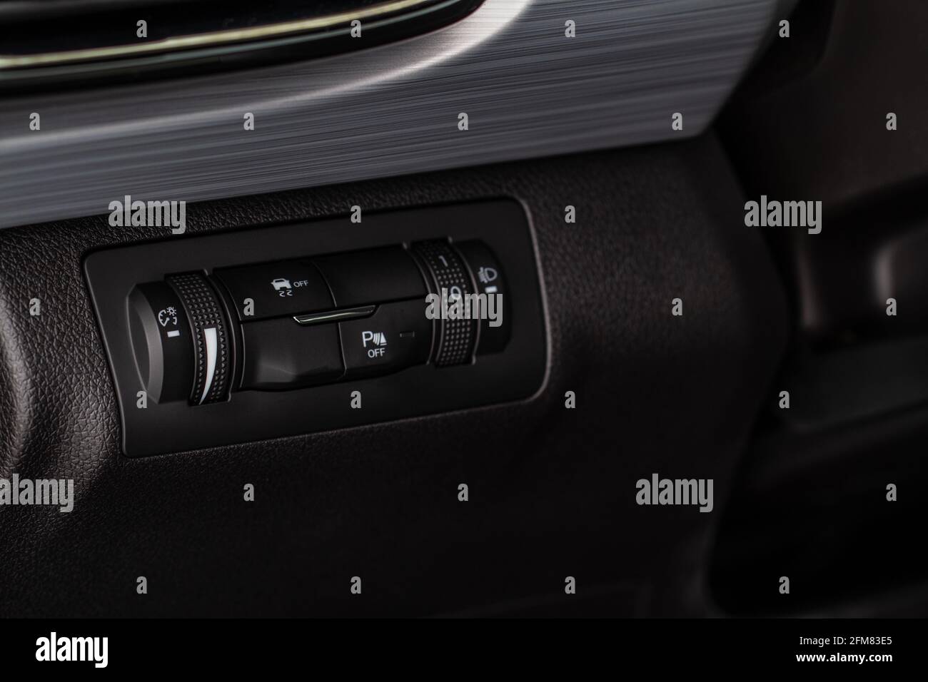 Close up view of modern car electronic safety systems control panel ...