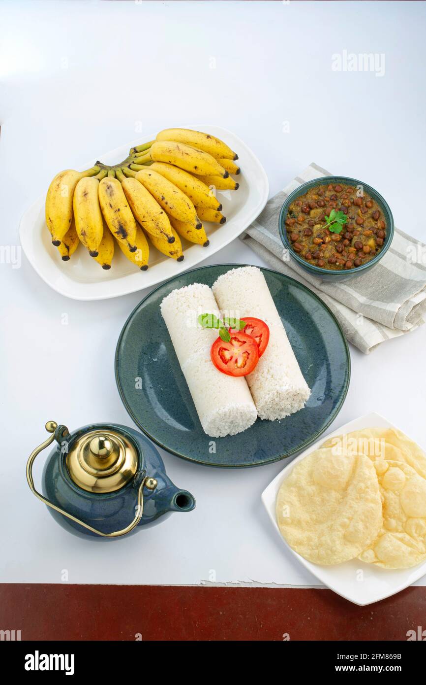 PUTTU -Kerala special breakfast made using rice flour which is arranged ...