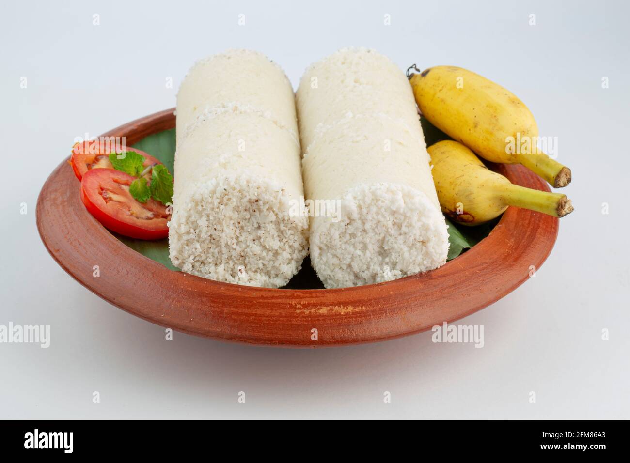 Puttu or White rice puttu -Kerala special breakfast items made using ...