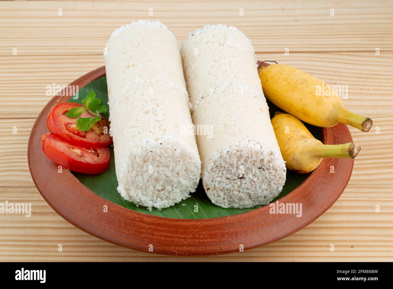 Puttu or White rice puttu -Kerala special breakfast items made using ...