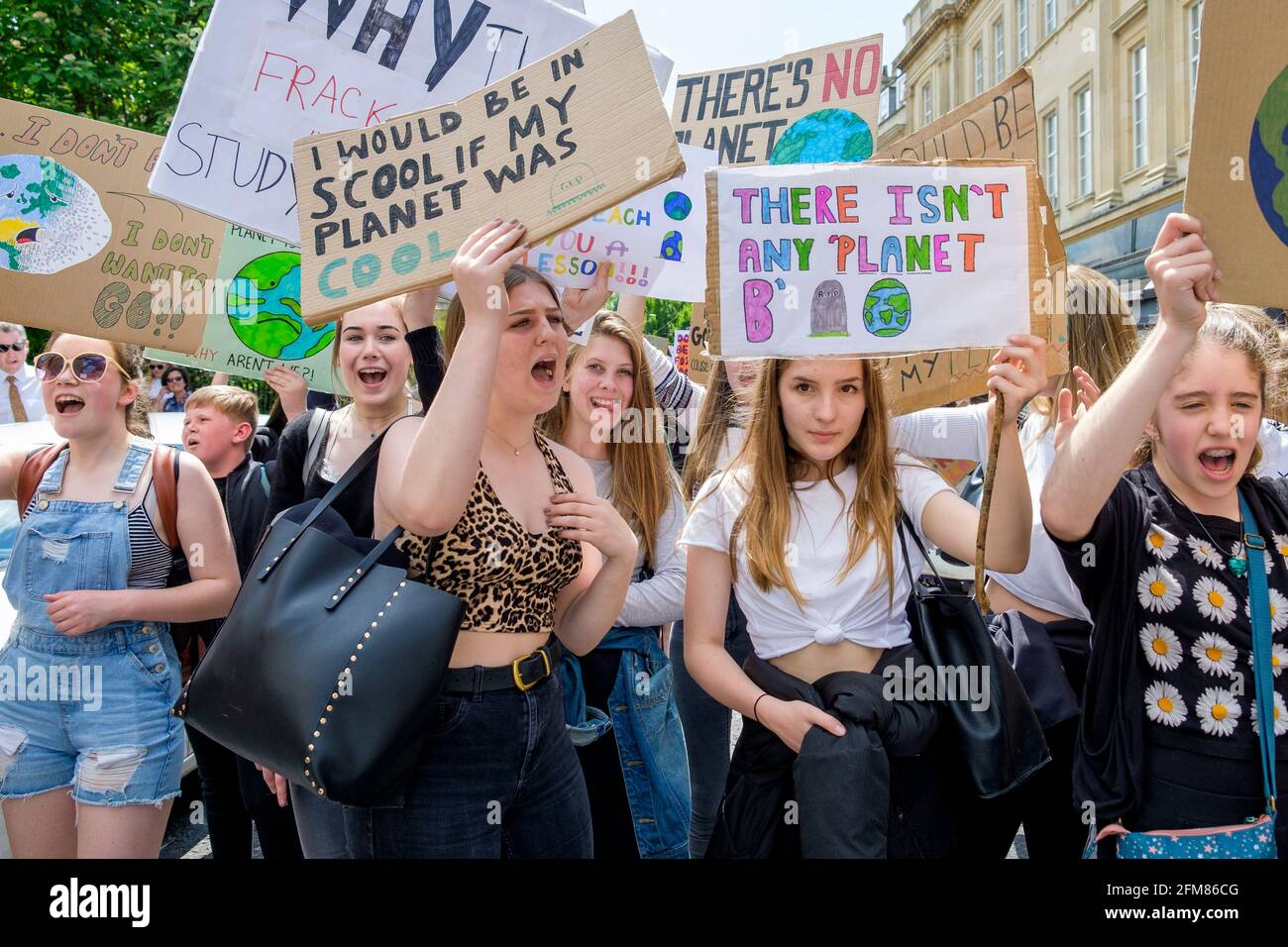 Bath college students and school kids carrying climate change placards ...