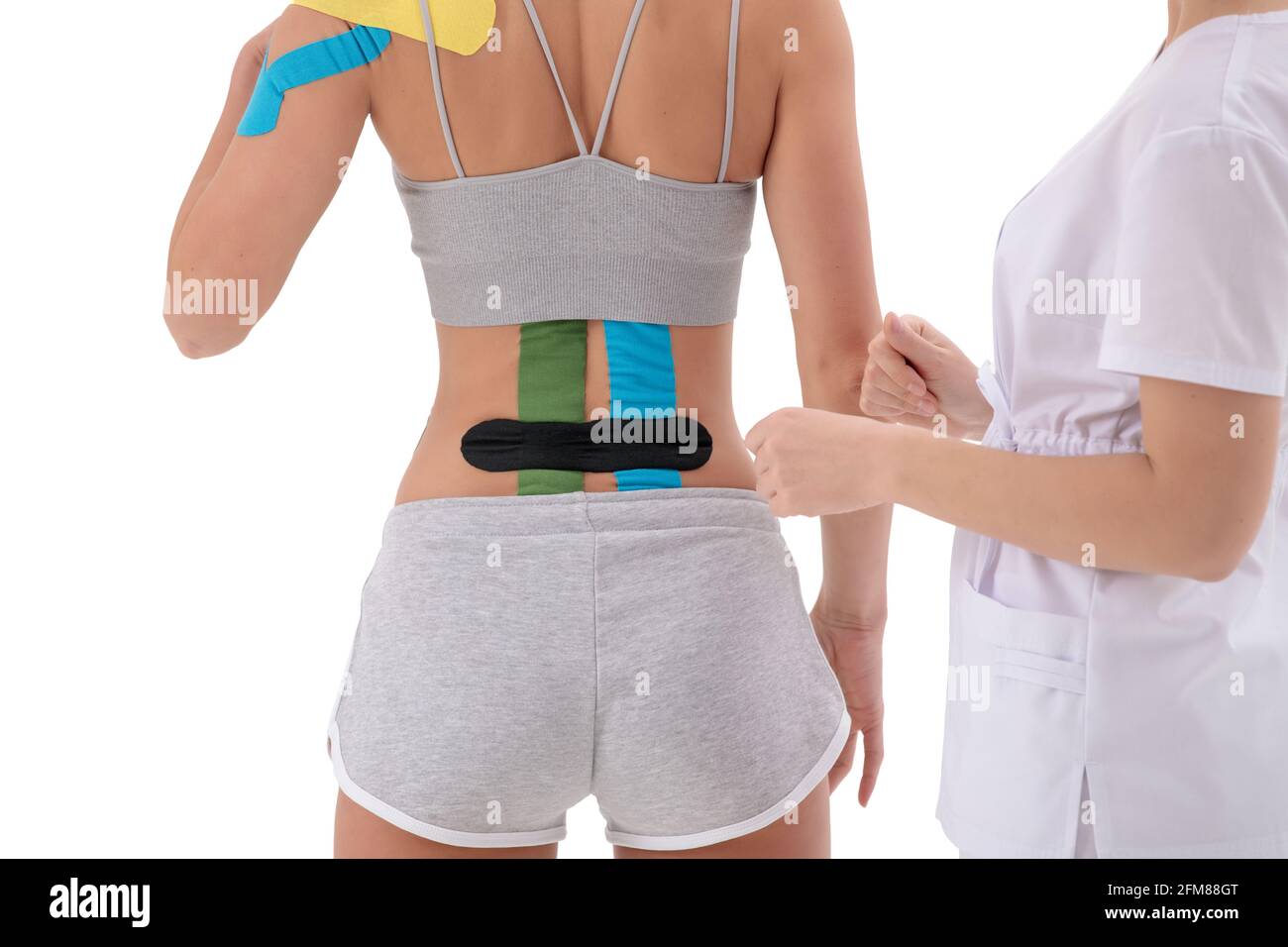 dynamic functional bandage with kinesio taping on the female back ...