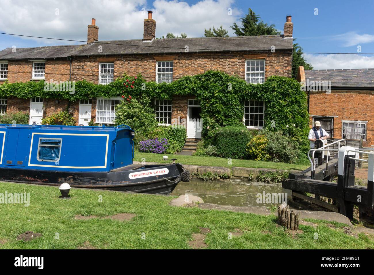 Narrowboat and lock gates on the Grand Union canal, Whilton LOcks ...