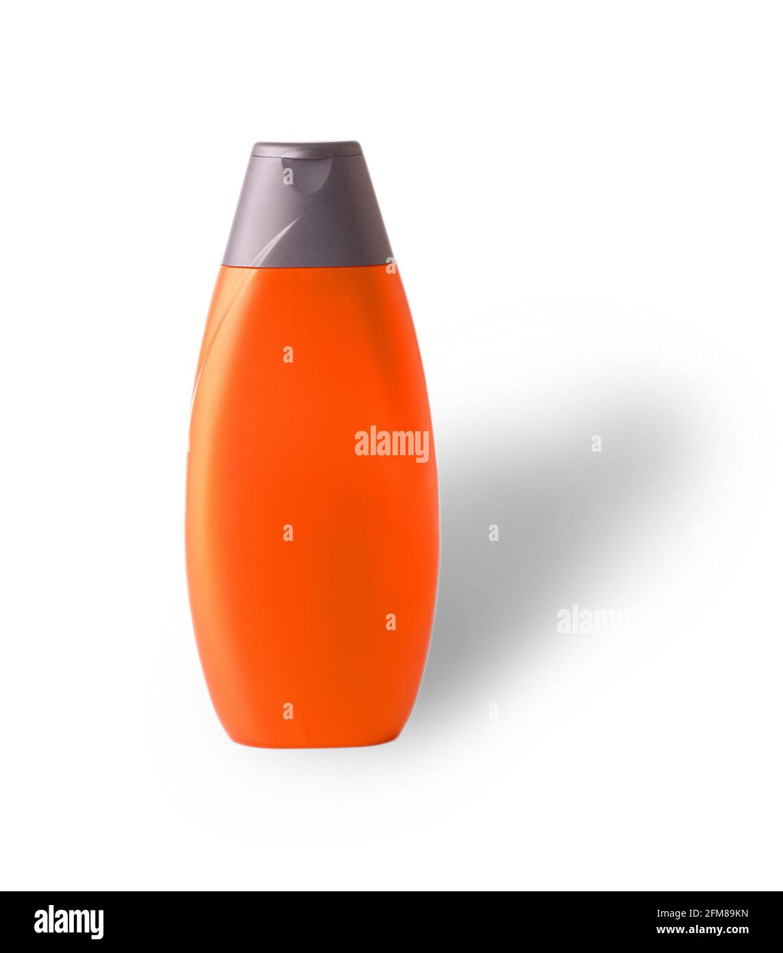 red plastic bottle with male shampoo carved on a white background Stock ...