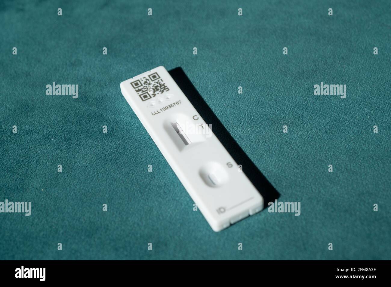 The NHS issued lateral flow test for testing at home in the UK. Shown ...