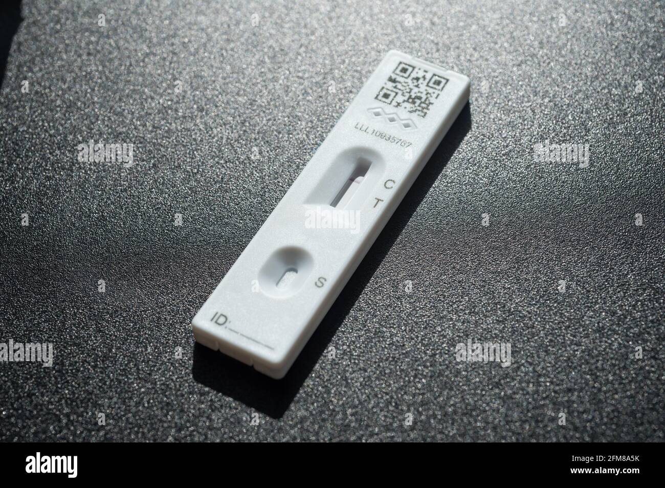 The NHS issued lateral flow test for testing at home in the UK. Shown ...