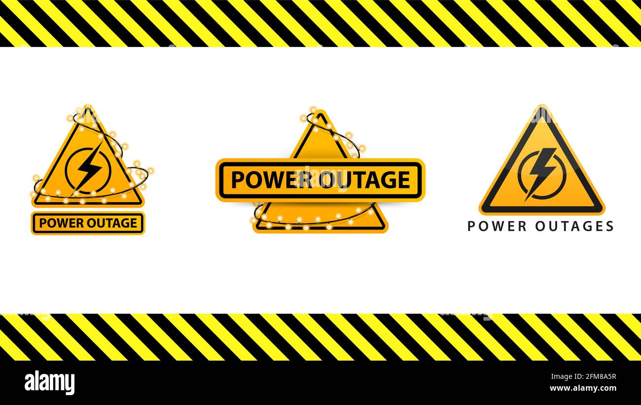 Power outage, collection yellow warning signs wrapped with garland on ...