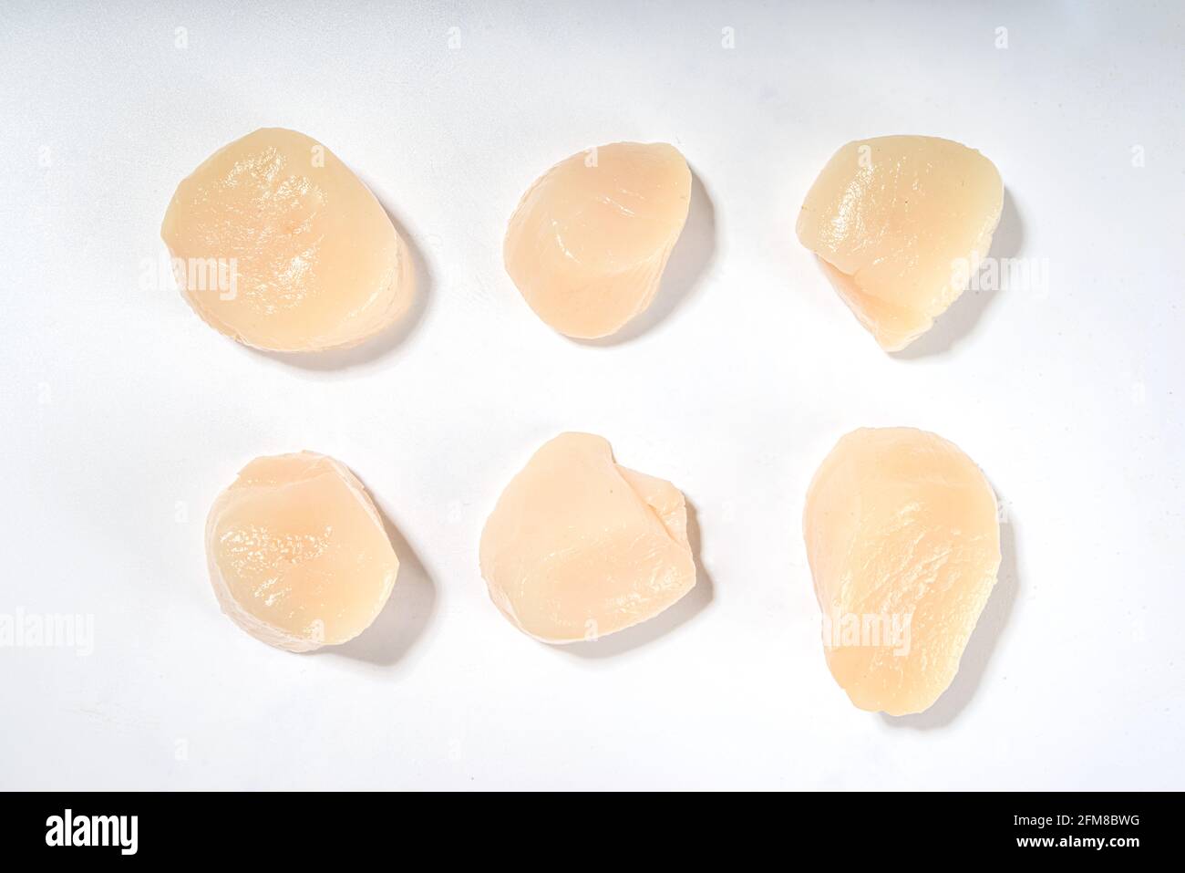 Raw seafood scallops, peeled fresh isolated on white background Stock ...