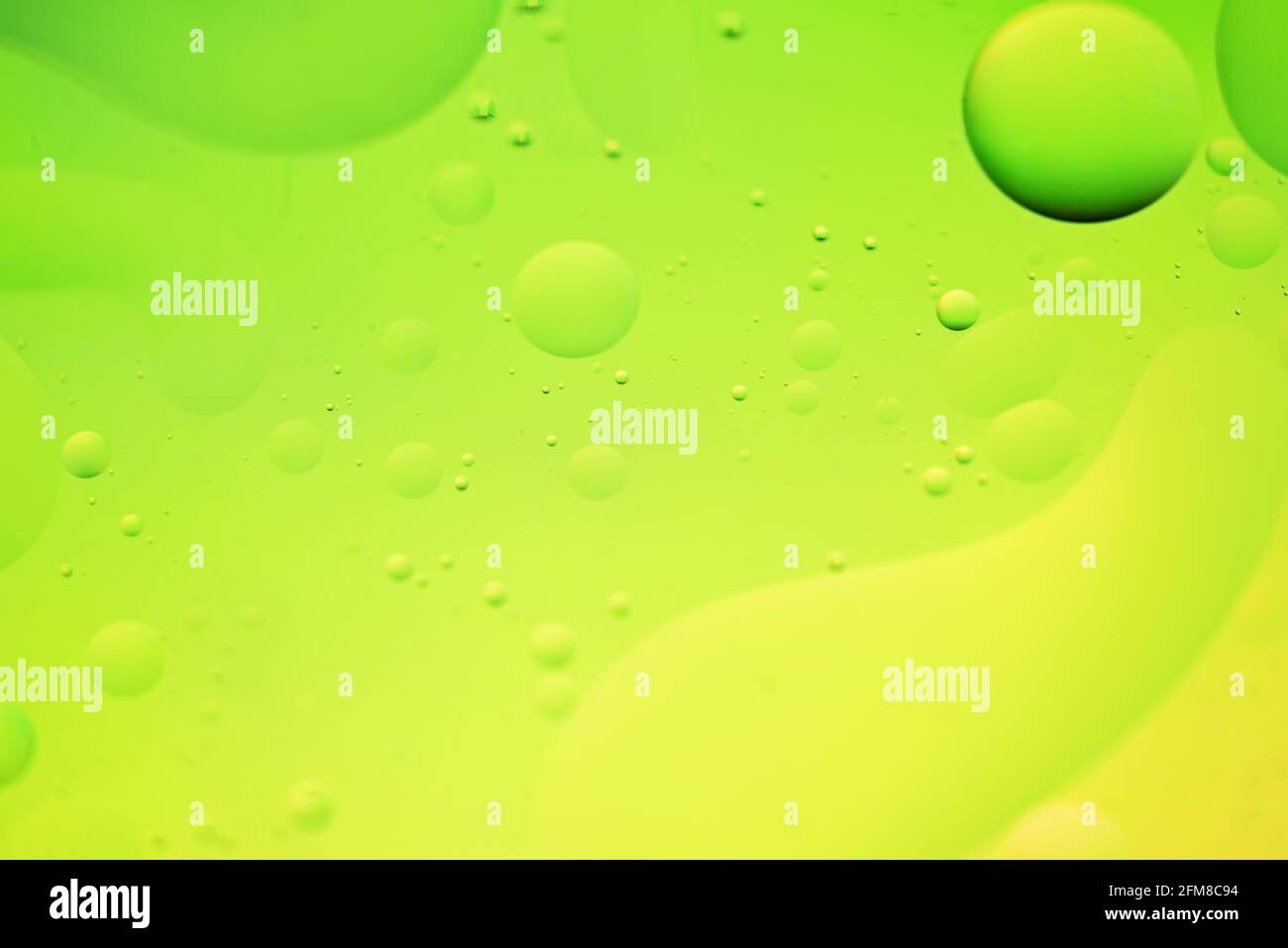 Colorful abstract background with oil drops on water Stock Photo - Alamy