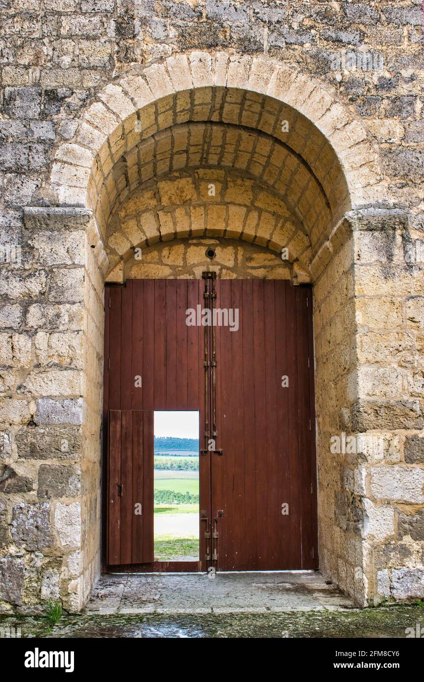 Wooden gate and stone arch of the 13th-century medieval castle of ...