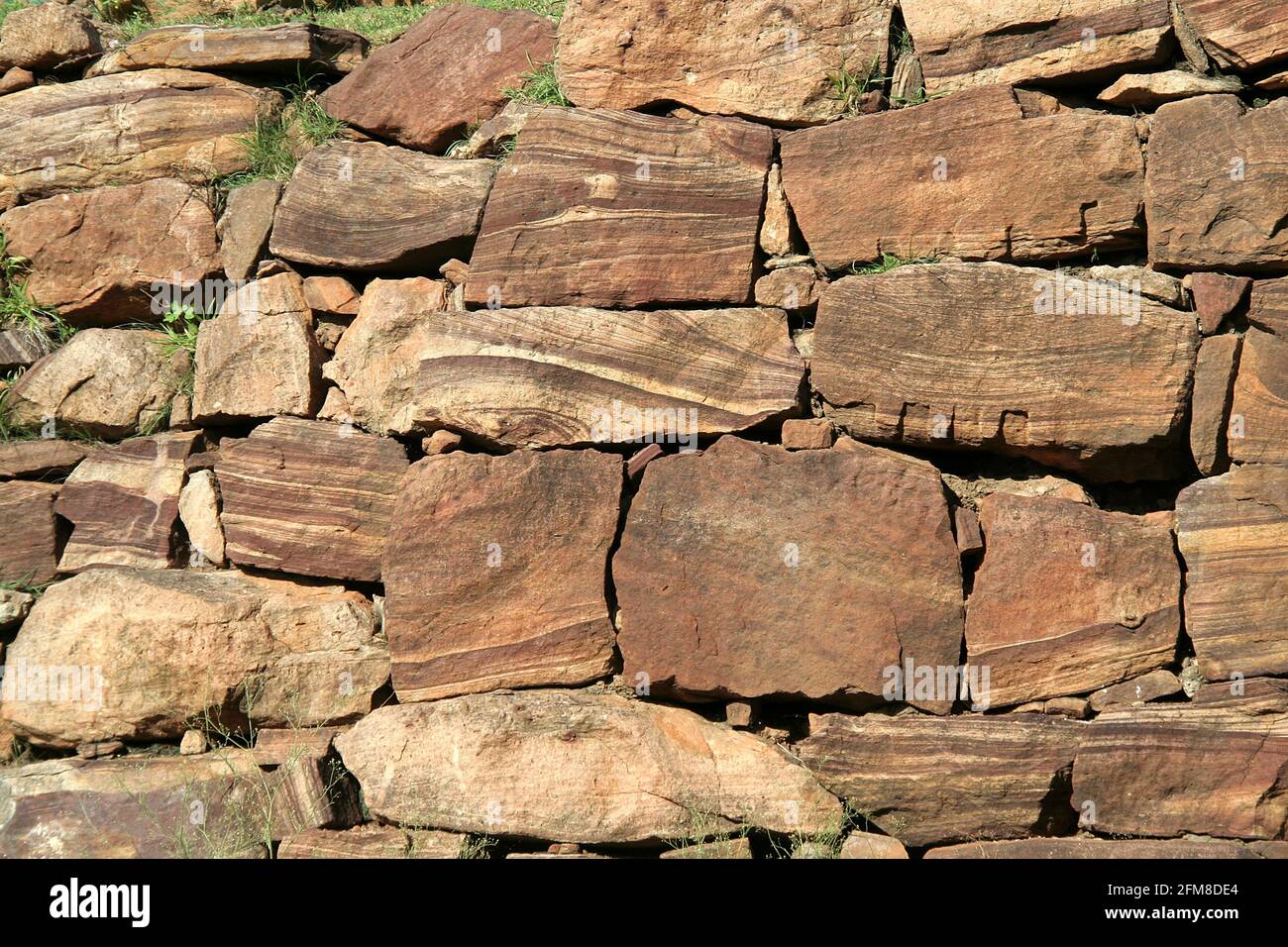 Wall built with dressed stones having a beautiful grain pattern Stock ...