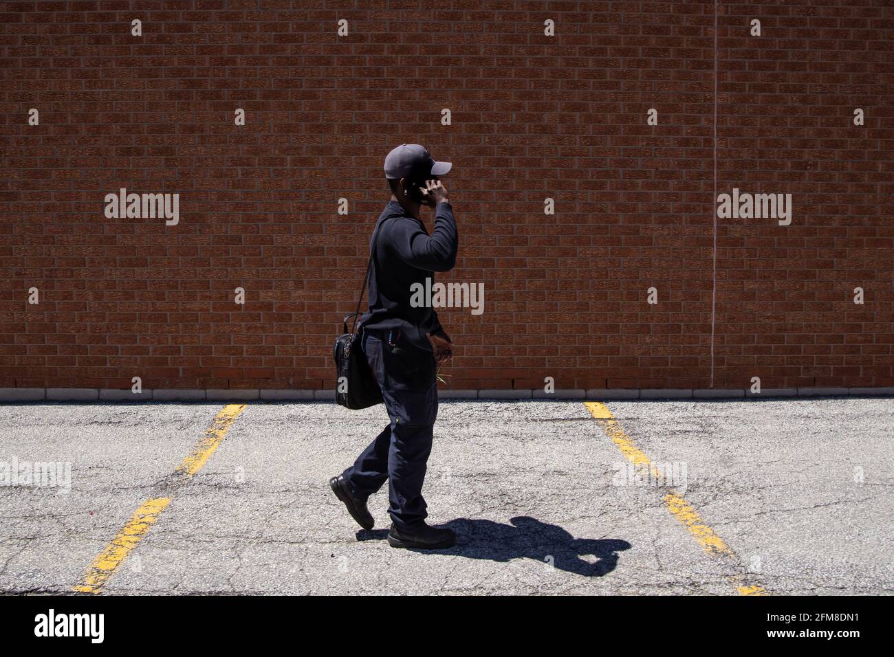 A rear view of parking security watching over parking area. Security ...