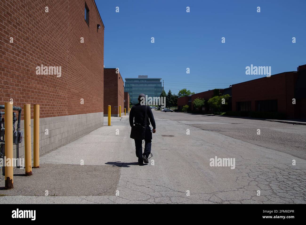 A rear view of parking security watching over parking area. Security ...