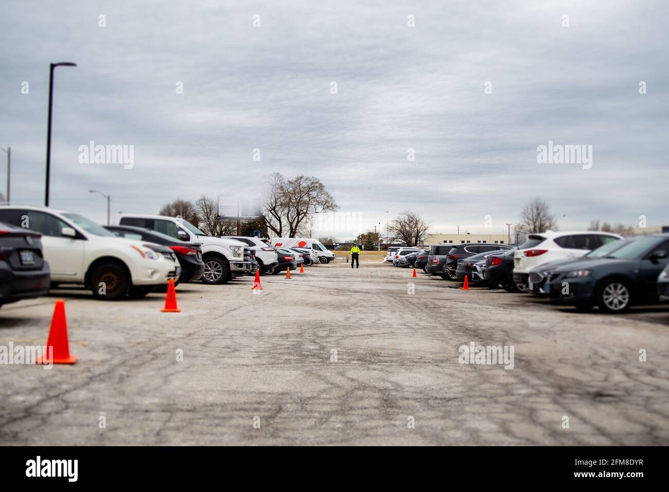 Parking security is watching over parking area. Security guard is ...