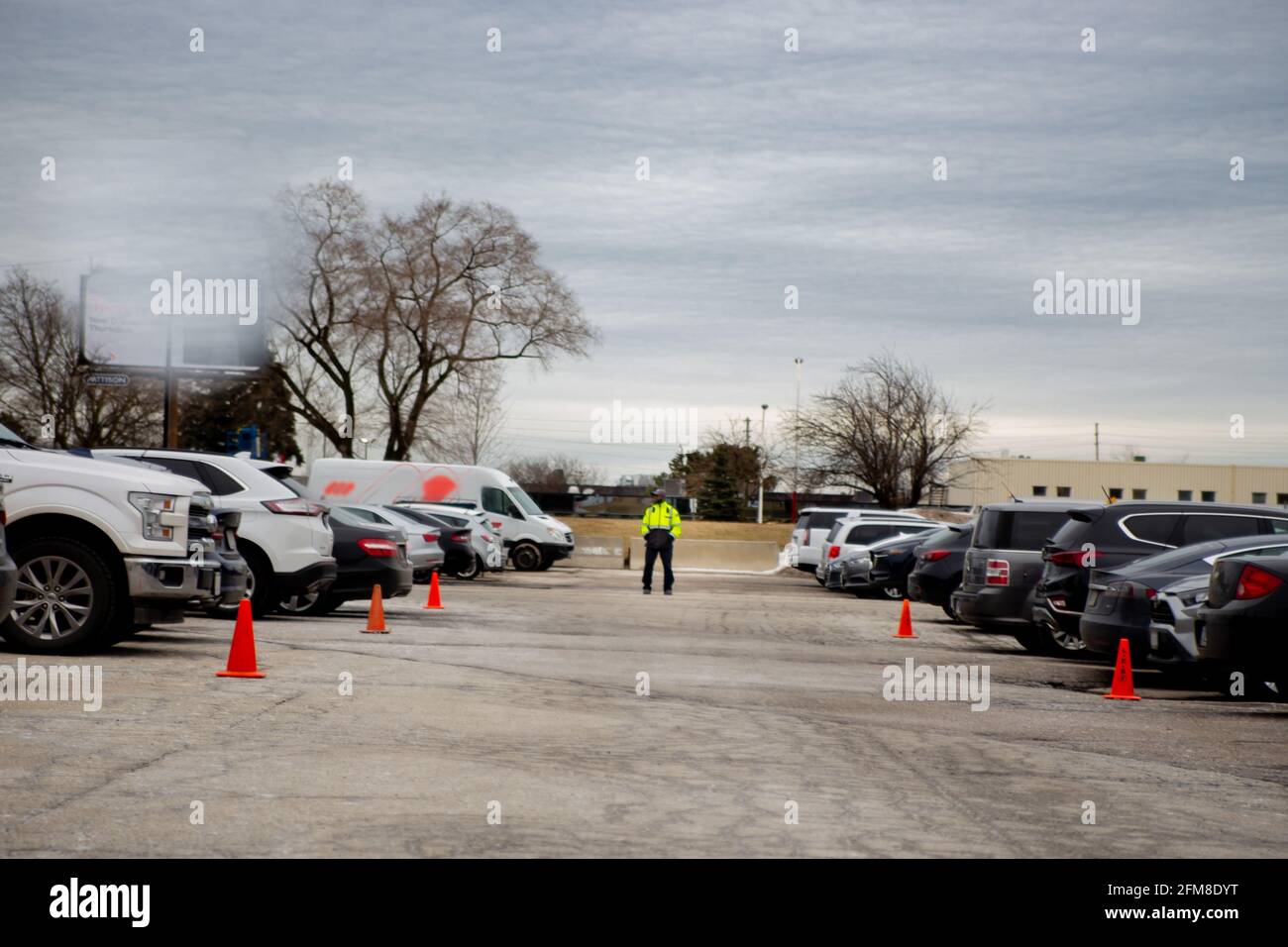 Parking security is watching over parking area. Security guard is ...